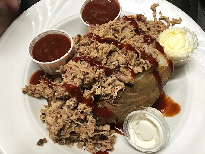 BBQ pulled pork atop a baked potato&mdash;proof that when two comfort foods fall in love, beautiful things happen on your plate.