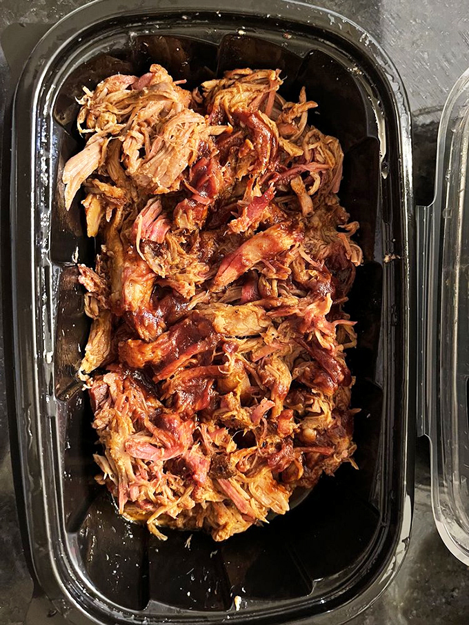 Pulled pork so perfectly shredded and sauced it makes you wonder if there's a tiny barbecue wizard hiding in the kitchen with tweezers.