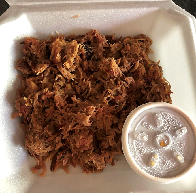 Pulled pork so tender it practically pulled itself &ndash; paired with a sauce cup that's begging to be emptied.