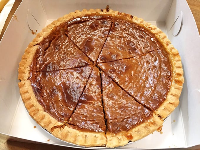 Simple pleasures done right &ndash; this crumb-topped pie waits patiently in its box, ready to transform an ordinary day into something special.