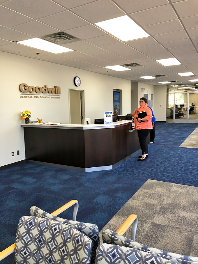The nerve center of Goodwill operations. That wooden reception desk has probably witnessed more retail redemption stories than a Hallmark Christmas marathon.