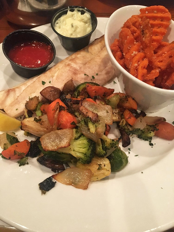 A perfectly grilled fish fillet with seasonal vegetables &ndash; the kind of simple, honest cooking that makes you question why anyone would eat anything else.