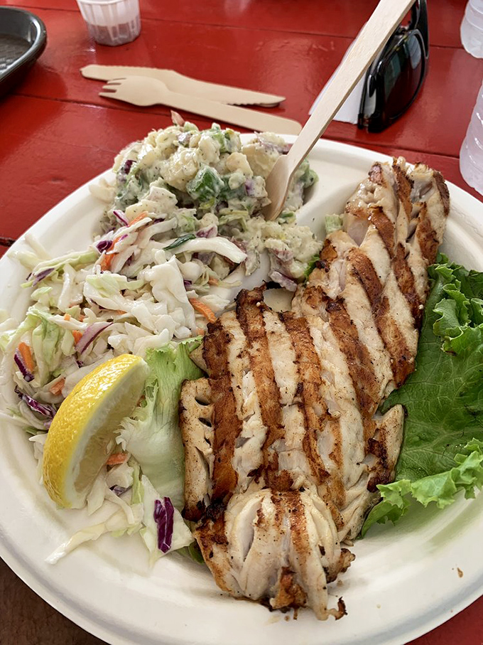 Grilled fish that makes you reconsider your relationship with seafood. Perfectly marked with grill lines and served with fresh slaw &ndash; simplicity at its finest.