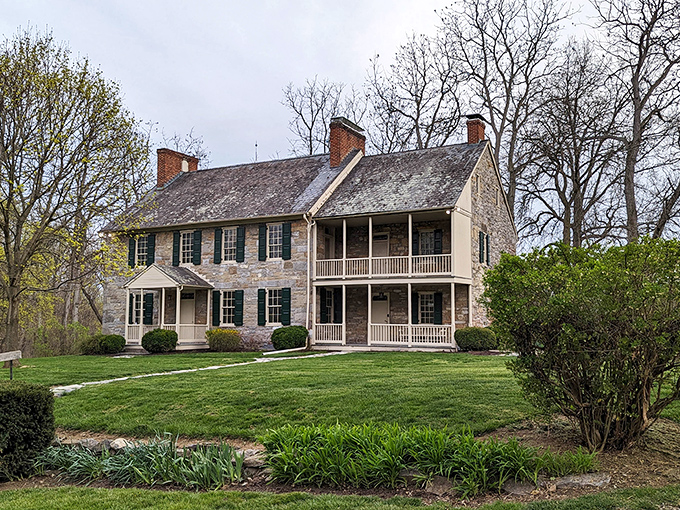 The limestone farmhouse at Renfrew Museum speaks of simpler times, its sturdy walls and dual porches having witnessed centuries of Pennsylvania seasons.