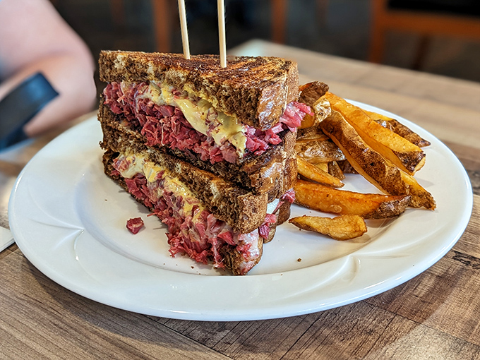 The Reuben sandwich here isn't messing around&mdash;look at that glorious stack of corned beef and melted cheese that's practically bursting from its toasty prison.