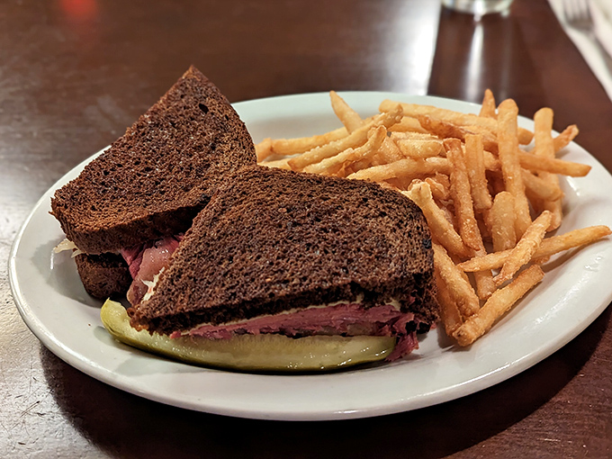 The Reuben sandwich &ndash; where pumpernickel, corned beef and sauerkraut perform a perfectly choreographed dance of flavors. Those fries aren't slouching either.