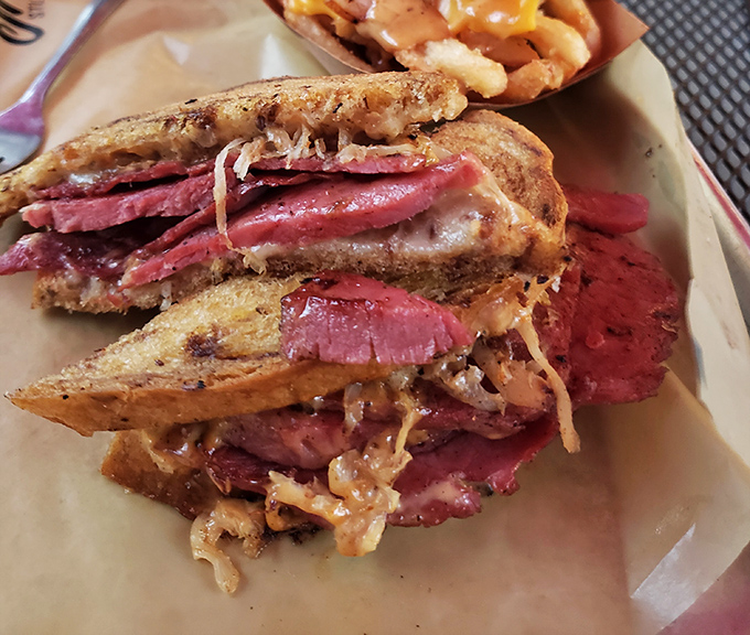 This Reuben isn't just a sandwich, it's architecture&mdash;layers of corned beef, sauerkraut, and Swiss creating the skyscraper of sandwiches.