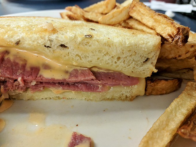 Two patrons enjoying the simple pleasure of good food and conversation&mdash;the true currency of any great local eatery.