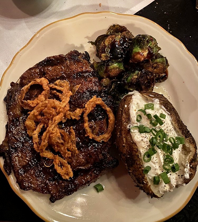 This ribeye, topped with crispy onion frizzles, isn't just dinner—it's what food dreams are made of after a long day on the range.