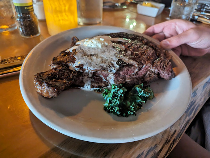 This ribeye with its melting pat of butter isn't just dinner &ndash; it's a religious experience that will have you speaking in tongues of pure culinary joy.