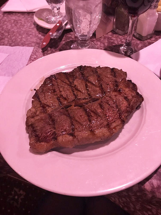 A ribeye that's seen just the right amount of flame, resting beside Texas toast that's ready to soak up the meaty symphony of juices.