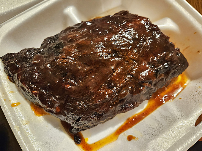 These ribs don't just fall off the bone&mdash;they practically leap into your mouth, their glistening surface a testament to hours of patient smoking.