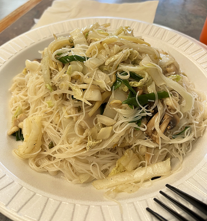 Rice noodles so delicate they practically whisper, paired with vegetables that still have something to say about freshness.