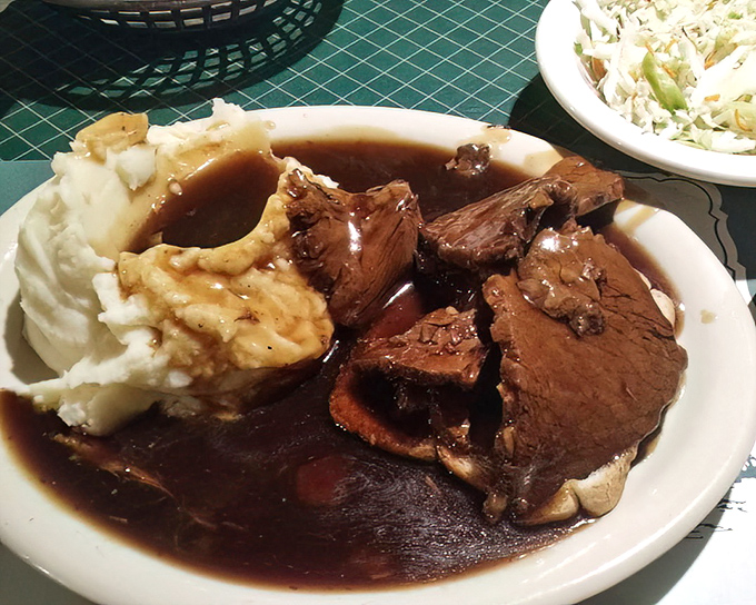 Roast beef swimming in rich gravy alongside cloud-like mashed potatoes. This isn't just dinner &ndash; it's edible therapy after a long day. 