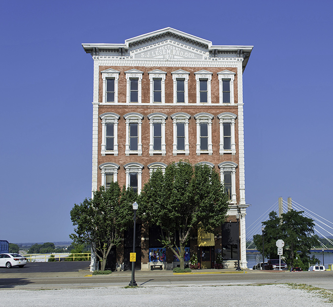 St. Francis Solanus Church reaches skyward with red-brick determination, a spiritual landmark that's been photobombing family portraits for generations.
