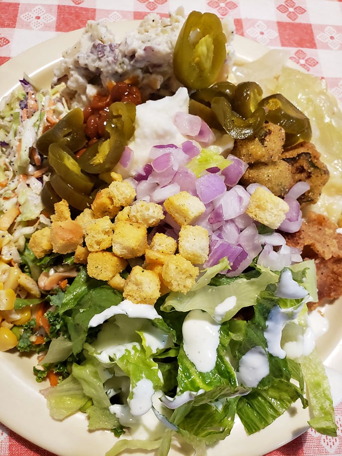 Fresh salad with all the fixings proves that even in barbecue country, balance is still technically an option if you want it.