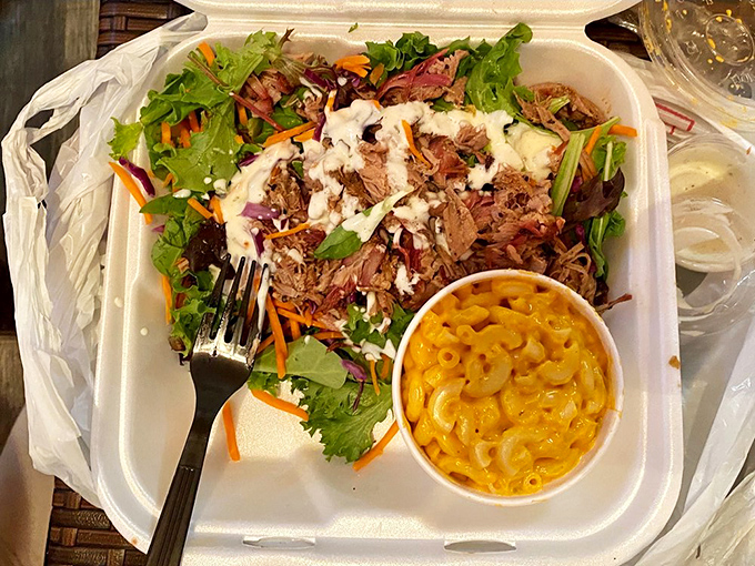Even salads get the smokehouse treatment&mdash;fresh greens topped with tender meat and creamy mac and cheese, proving vegetables can play nicely with barbecue.