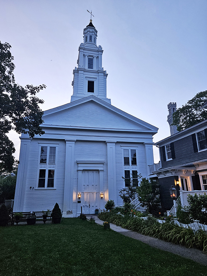 That white church glowing at dusk looks like it wandered straight out of a New England postcard.