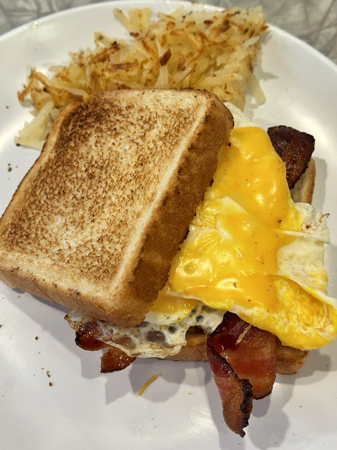 Breakfast sandwich architecture at its finest&mdash;where perfectly toasted bread meets the holy trinity of eggs, bacon, and cheese.