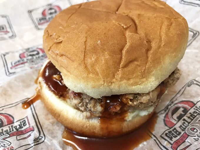 The sandwich that launched a thousand road trips. Simple white bread cradles chopped pork and sauce in what might be North Carolina's most perfect portable meal.