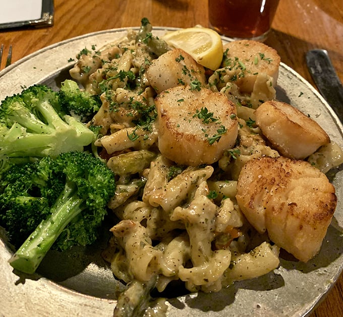 Perfectly seared scallops nestled among pasta like culinary jewels&mdash;proof that seafood in Pennsylvania can rival coastal offerings any day of the week.