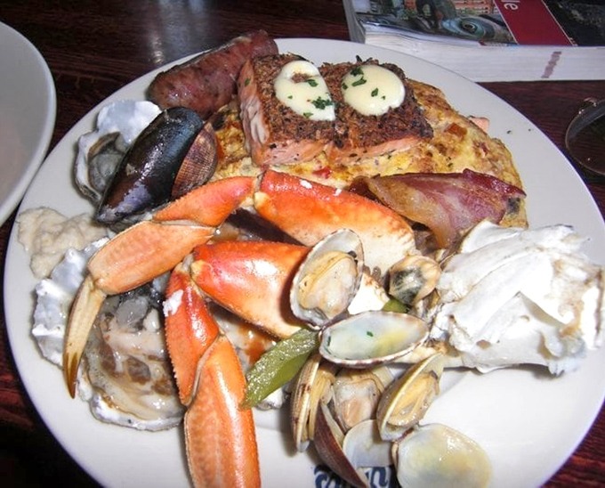 A seafood feast fit for Neptune himself&mdash;crab legs, salmon, and shellfish creating a plate that's essentially a maritime family reunion.