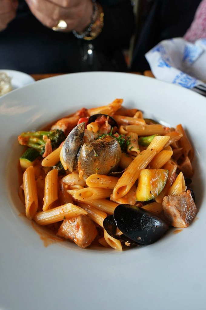 This seafood penne doesn't just have pasta—it's a Mediterranean vacation with mussels, vegetables, and tomato sauce playing starring roles.