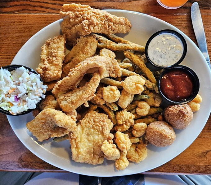 The seafood platter that answers the eternal question: "Why choose one when you can have it all?" Crispy, golden, and utterly irresistible.
