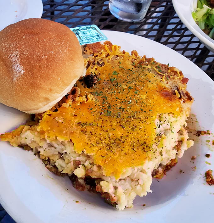 Shepherd's pie that doesn't just warm your stomach but hugs your soul—a blanket of cheese melted over a savory landscape of comfort.