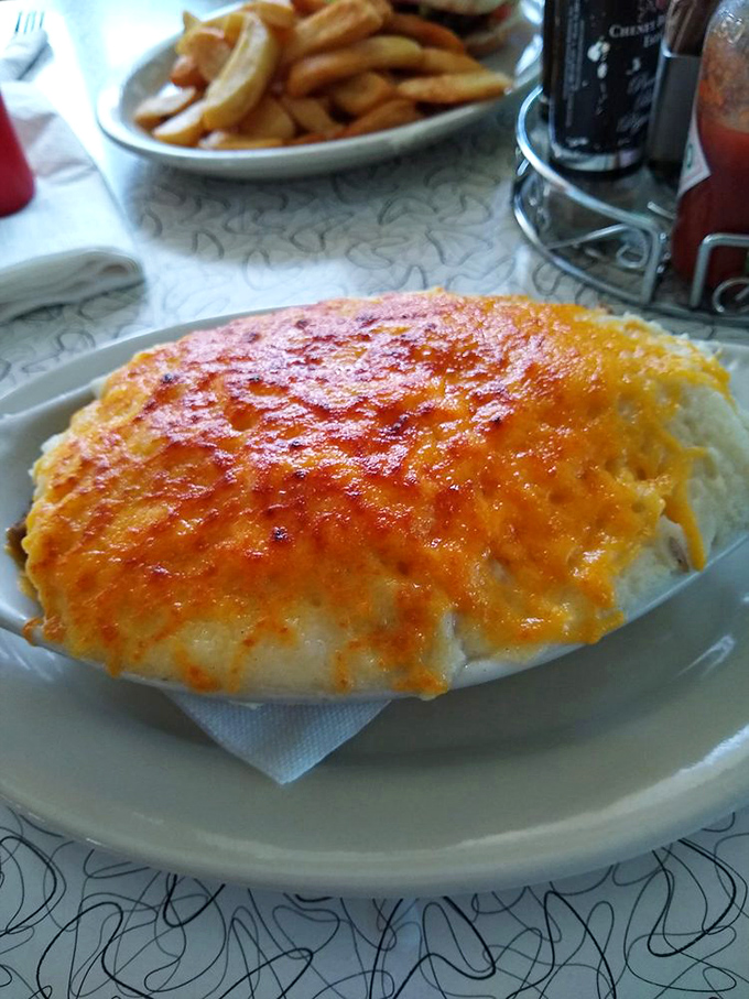 This bubbling masterpiece of melted cheese atop what appears to be a savory casserole proves that sometimes the most photogenic foods aren't the prettiest.