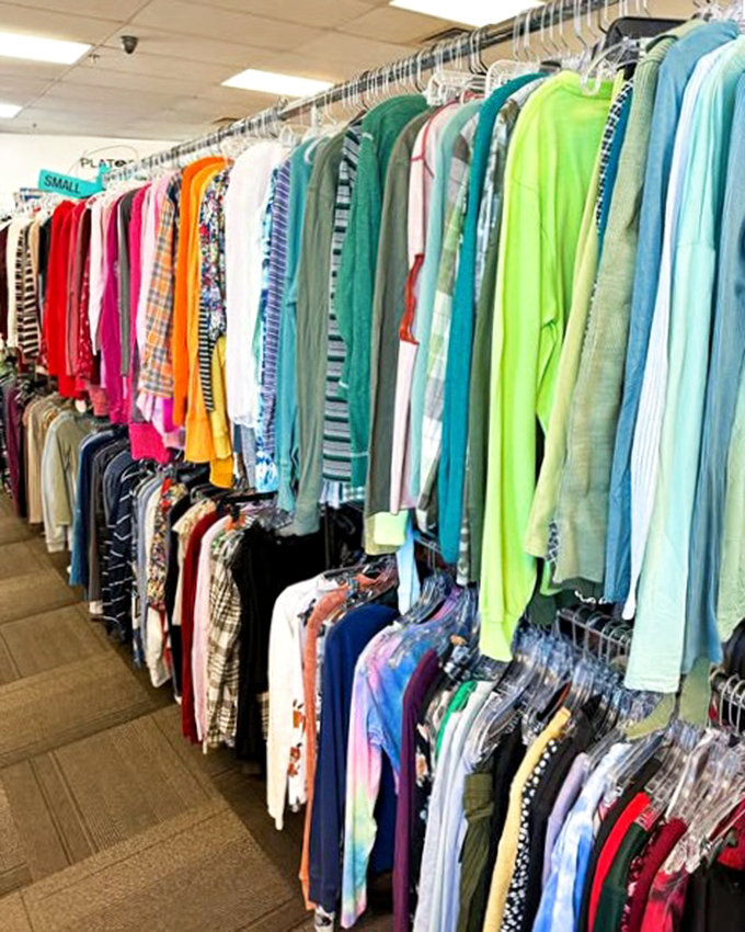 Rainbow rows of shirts and tops create a kaleidoscope of style choices for every occasion.