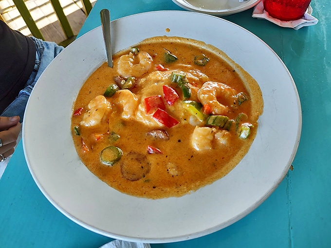 Shrimp and grits elevated to an art form&mdash;plump shrimp swimming in a velvety sauce with colorful vegetables that make this Southern classic Instagram-worthy before that was even a thing.