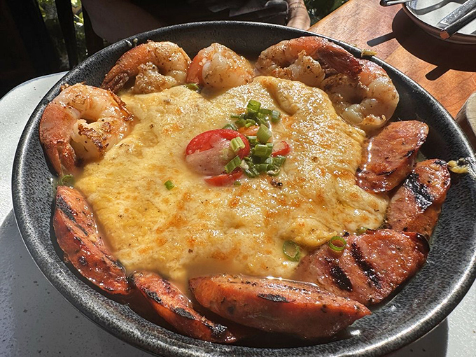 Southern comfort in a skillet&mdash;this shrimp and grits dish surrounds creamy cheese grits with perfectly seasoned shrimp and sausage like a delicious moat protecting a castle of flavor.
