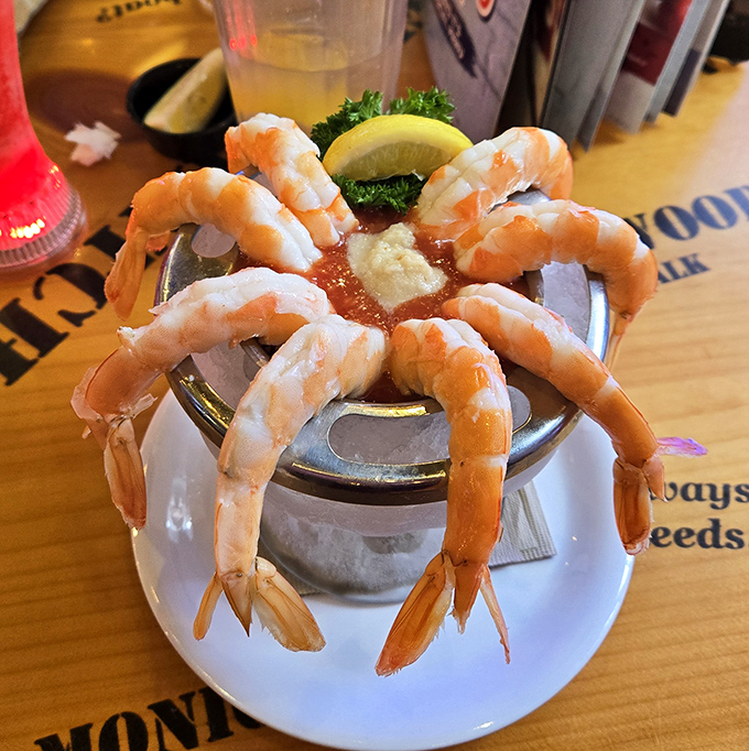 Shrimp cocktail arranged like a sunburst around sauce&mdash;proof that sometimes the simplest presentations create the most dramatic entrances.