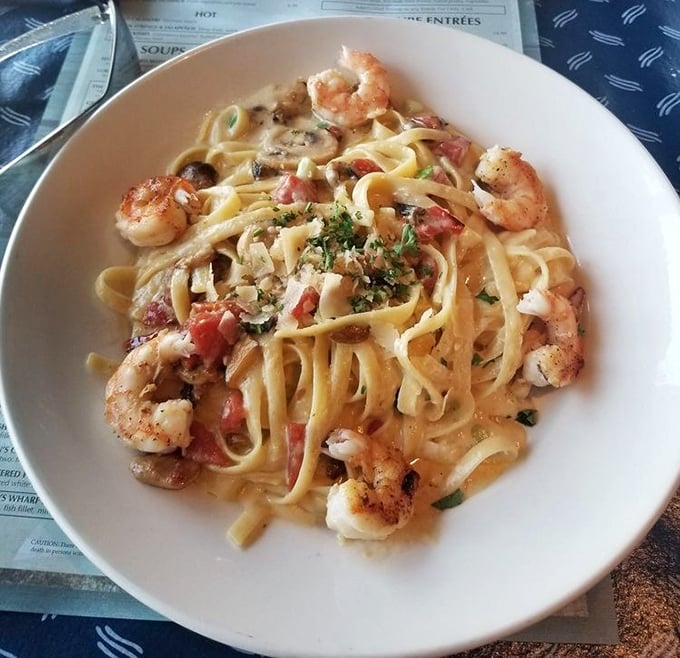 Pasta that doesn't apologize for being exactly what it is: a glorious vehicle for delivering perfectly cooked Gulf shrimp to your face.