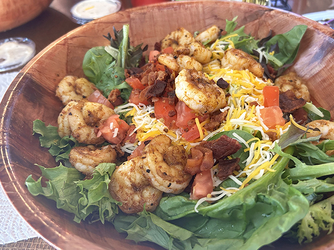Who knew a salad could look this exciting? Seasoned shrimp perched atop fresh greens with cheese and tomatoes&mdash;proof that Louisiana knows how to make even lettuce interesting.