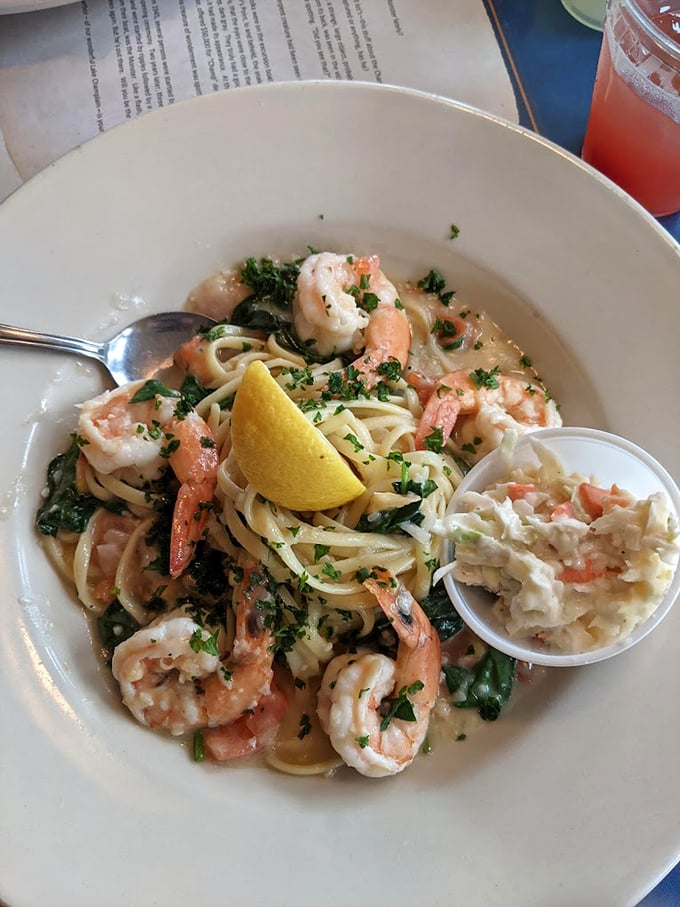 Shrimp scampi that's doing the backstroke in garlic butter with a side of coleslaw&mdash;a perfect marriage of indulgence and freshness.