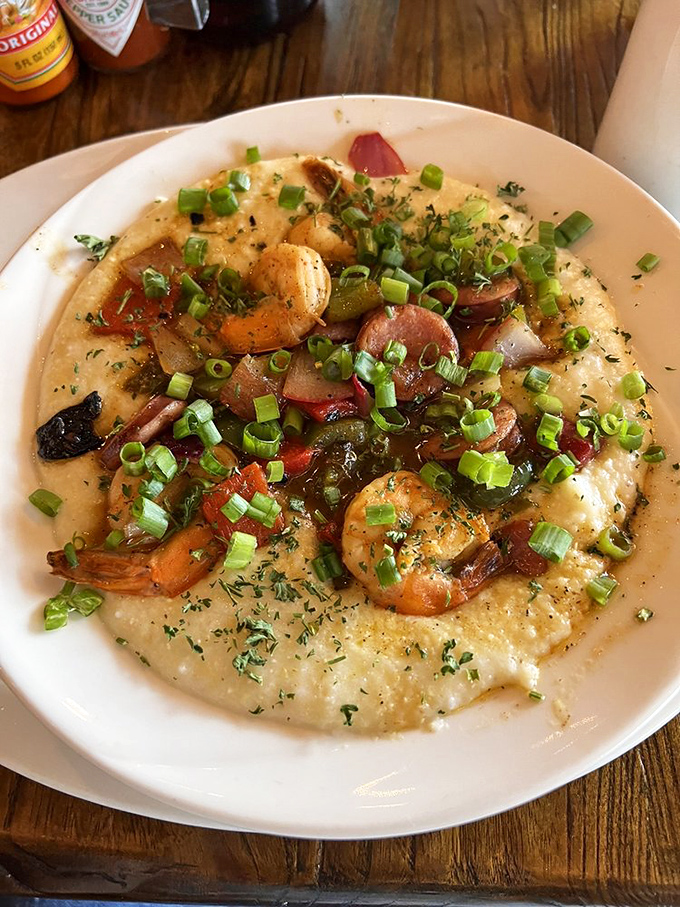 Southern comfort in a bowl&mdash;creamy grits providing the perfect canvas for plump shrimp and savory andouille. A spoonful of Tennessee sunshine.