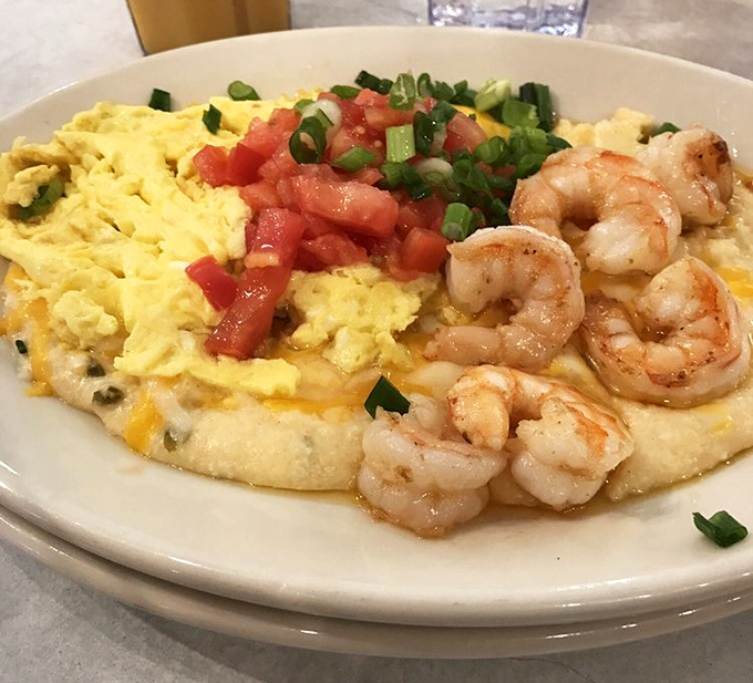 Shrimp and grits: where the ocean meets the South in a dish so comforting it feels like a warm hug from your favorite aunt.