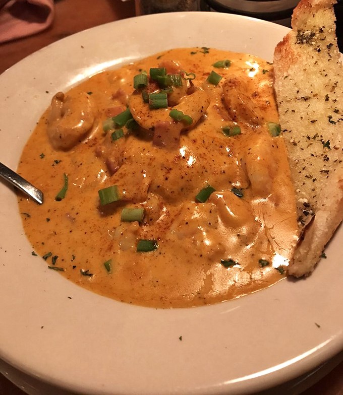 Southern coastal cuisine at its finest&mdash;shrimp nestled in a creamy sauce that whispers secrets of Lowcountry cooking techniques passed down for generations.