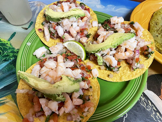Shrimp tacos topped with avocado slices&mdash;nature's butter&mdash;creating a seafood fiesta that would make Poseidon himself jealous.