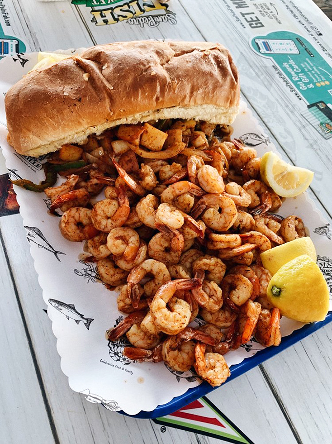 The legendary shrimp sandwich comes with enough crustaceans to make you wonder if there's any bread hiding underneath that glorious pile of seasoned goodness.