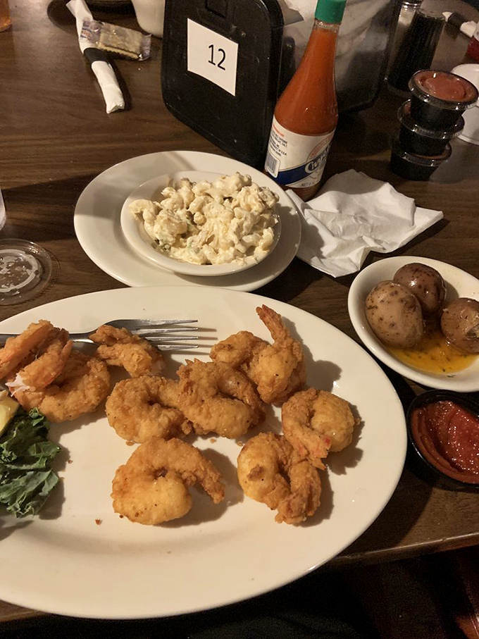 Golden fried shrimp that snap between your teeth, paired with classic sides that would make your Southern grandmother nod in approval.