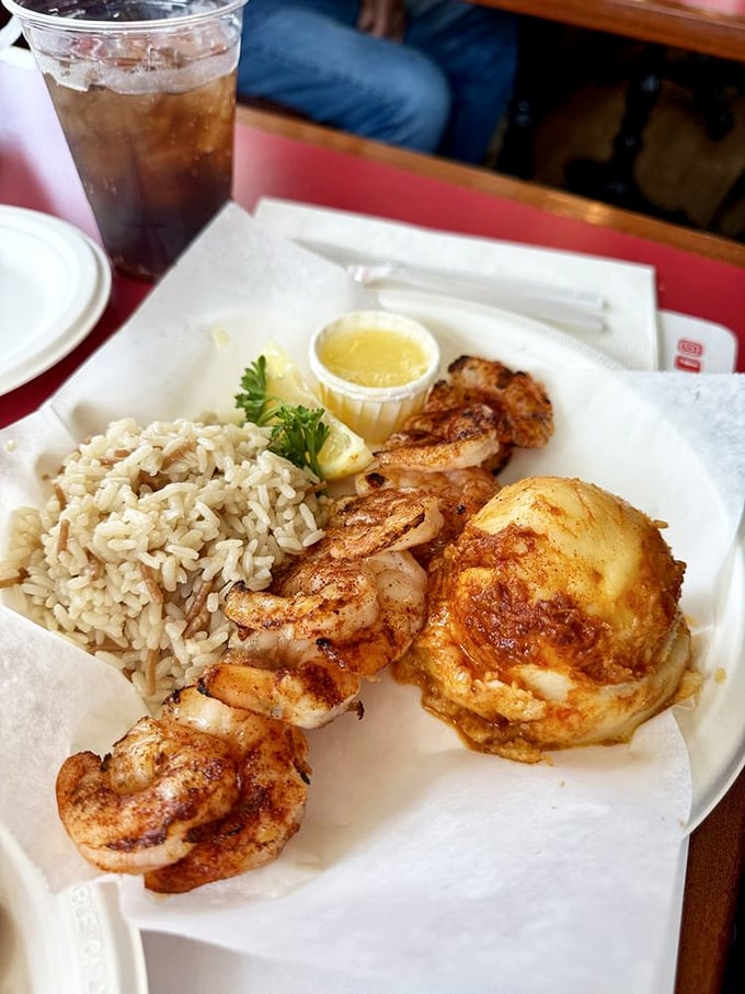 Plump shrimp on a skewer, seasoned to perfection, with a crab cake companion that would make other restaurants weep with jealousy.