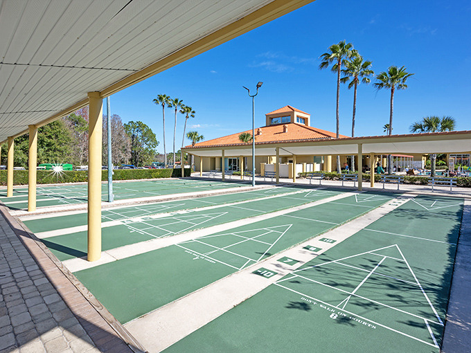 Covered shuffleboard courts because even retirement sports deserve protection from Florida's mood swings.