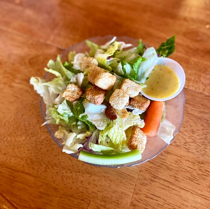 A side salad that knows its role&mdash;fresh, crisp, and ready to balance out the indulgence that's coming next.