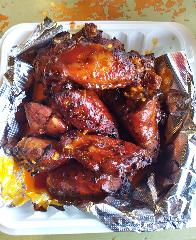 These wings aren't just smoked&mdash;they're transformed. The kind of sticky, glistening perfection that makes you forget about your dry cleaning bill.