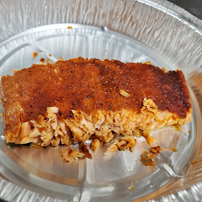 Smoked salmon with a burnished exterior that proves Heaven's Table doesn't just master traditional BBQ – they elevate everything that meets their smoker.