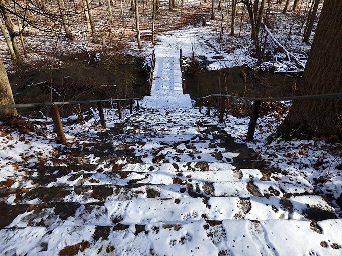 Winter's quiet magic: A snow-dusted footbridge invites brave explorers to discover Hacklebarney's serene cold-weather personality.