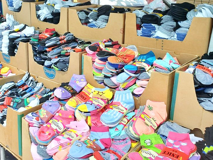 Sock boxes create a kaleidoscope of foot fashion. More patterns and colors than a paint store sample wall, all waiting to brighten up shoe interiors everywhere.